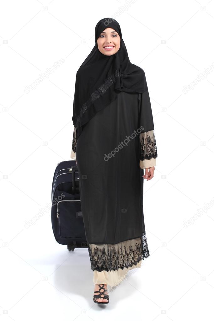 Full body of an arab saudi woman traveler walking Stock Photo by ...