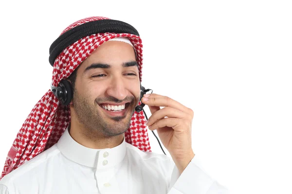 Arab saudi operator man working with free hands headset on the phone ...