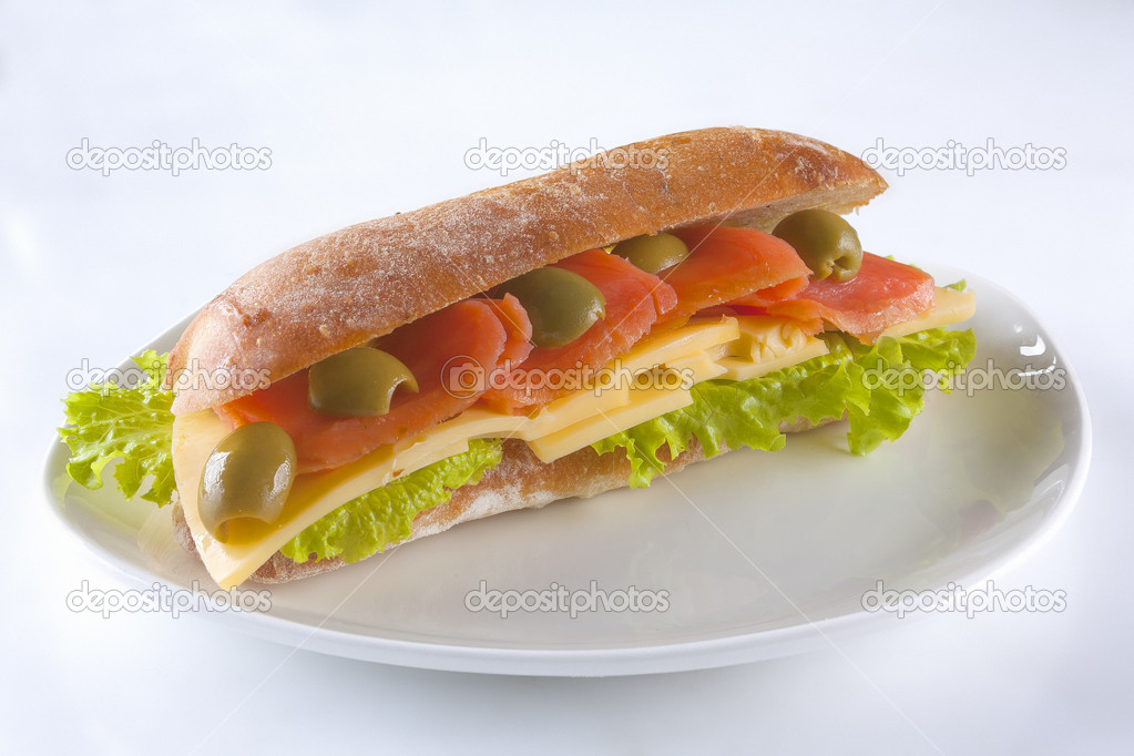 Foot long sandwich on a plate isolated on white background Stock Photo ...