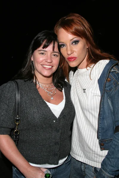 Jenny Leeser and Kerri Kasem outside the Giuseppe Zanotti Boutique ...