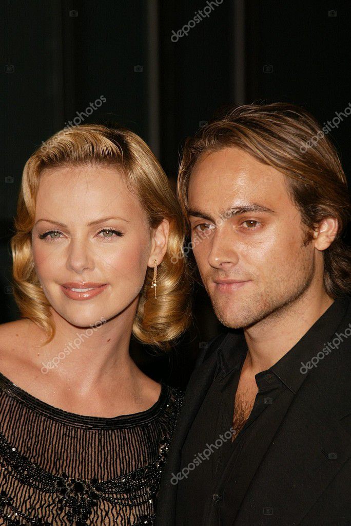 Charlize Theron and Stewart Townsend — Stock Editorial Photo © s_bukley ...