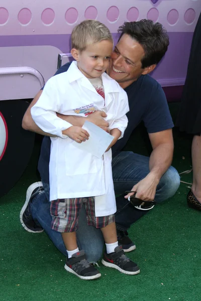 Scott Wolf and son Jackson Kayse Wolf - Stock Image - Everypixel