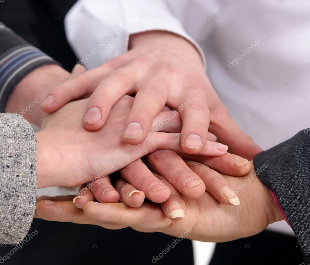 Group handshake Stock Photo by ©shmeljov 16167285