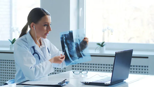 Professional medical doctors working in hospital office making ...