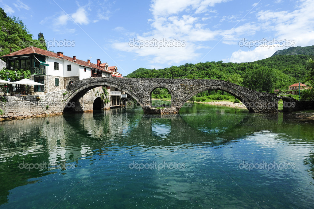 The old arched stone bridge of Rijeka Crnojevica Stock Photo by ©Fotoember 49490627