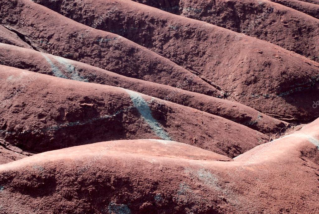 Red clay badlands dunes Stock Photo by ©ArchonCodex 32927259