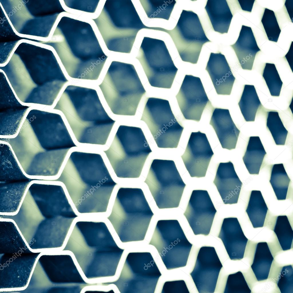 Abstract metal honeycomb structure Stock Photo by ©adistock 42946437