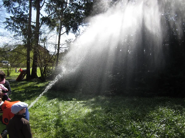 Group of cute kids spitting water outdoors Stock Photos, Royalty Free ...