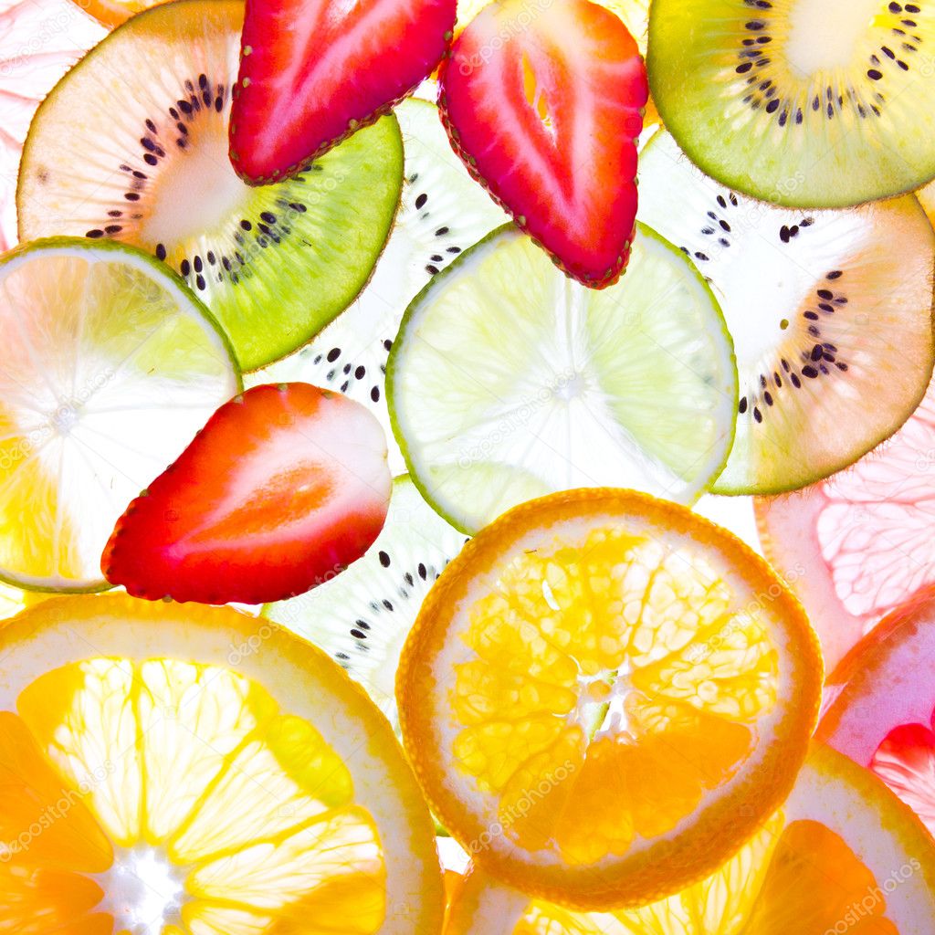 Sliced fruits background Stock Photo by ©lamento 21592543