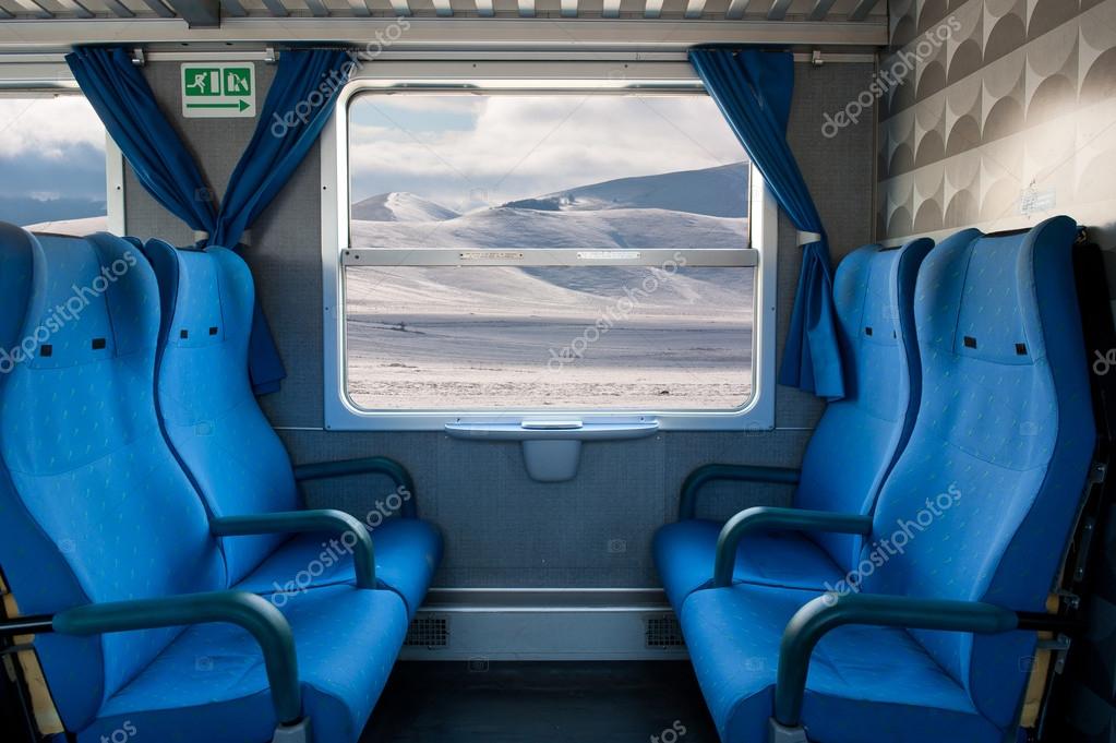 Window train with snow landscape and empty seats — Stock Photo © pio3 ...