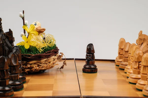 Chess pieces on the table — Stock Photo © kulkann #100640582