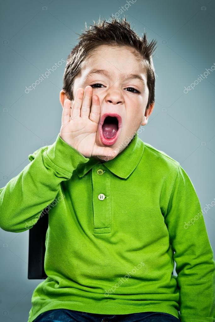 Cute Kid Shouting at Camera — Stock Photo © WorkshopExp #21942047