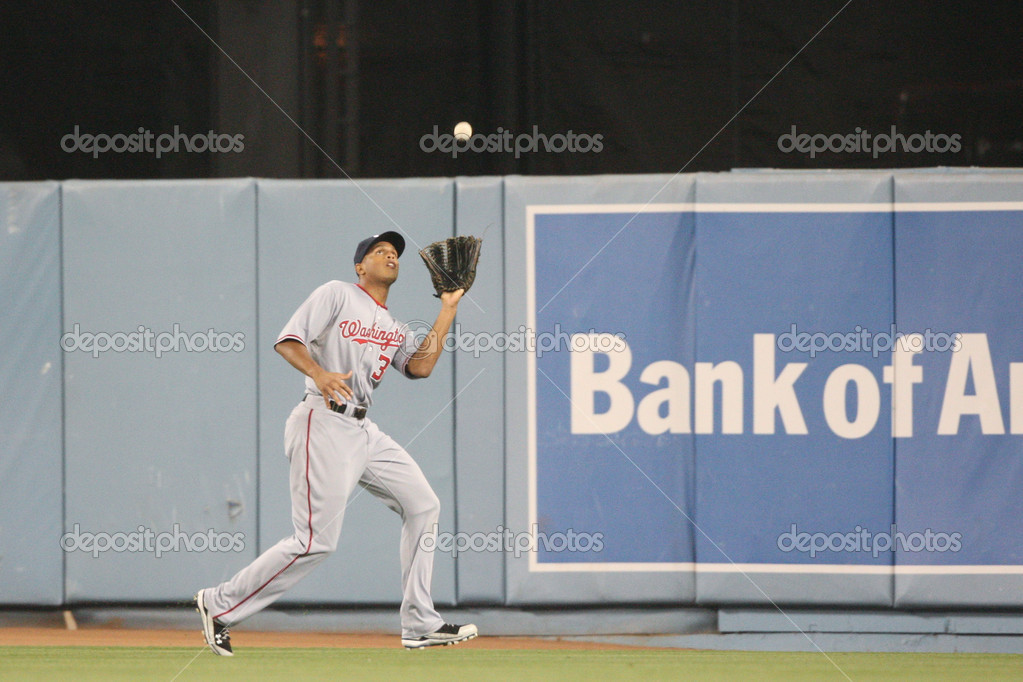 Justin Maxwell catches a fly ball during the game — Stock Editorial Photo © photoworksmedia ...