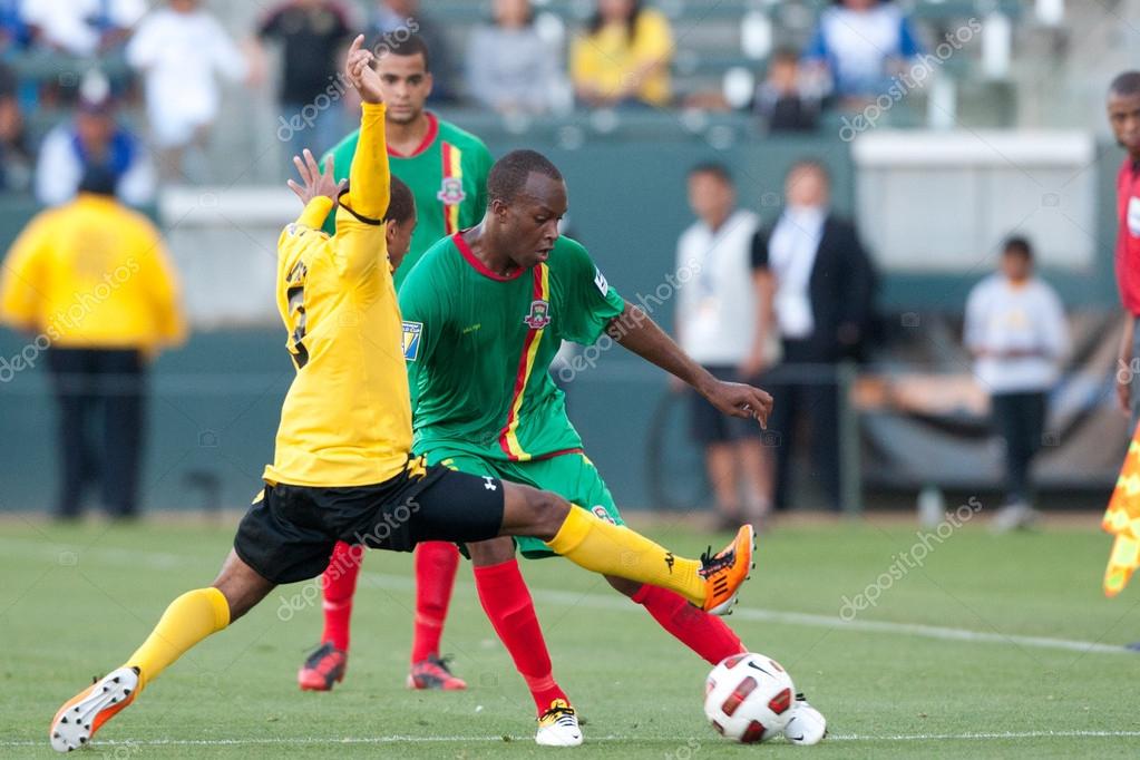 Eric Vernan and Anthony Straker in action during the game — Stock ...