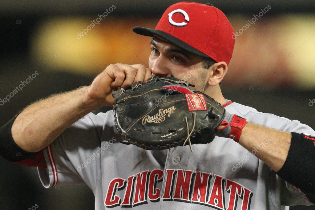 JOEY VOTTO adjusts his glove during the game – Stock Editorial Photo ...