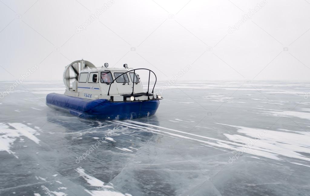 Hovercraft transporting on the ice of Lake Baikal Stock Photo by ...