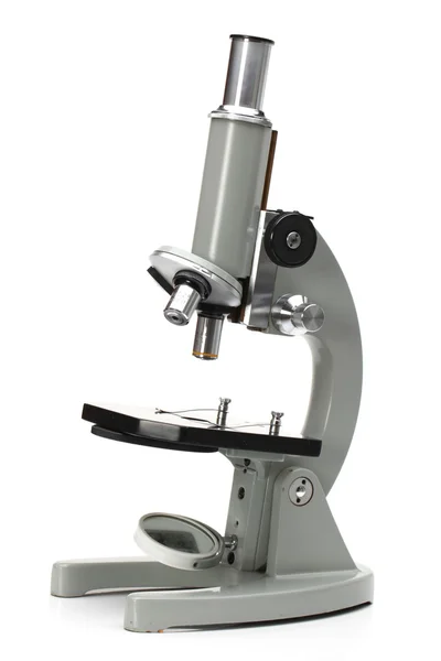 Old microscope isolated on white background — Stock Photo ...