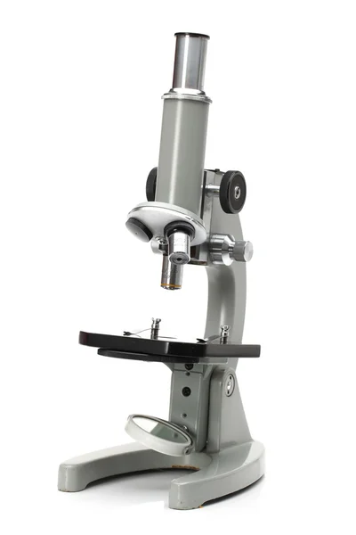 Old microscope isolated on white background — Stock Photo ...