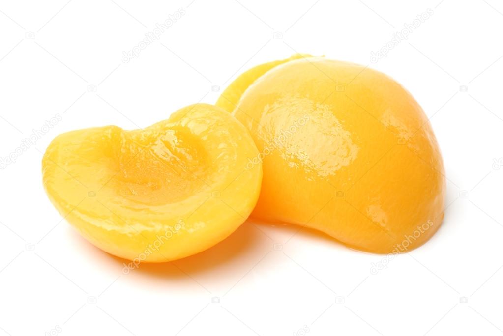 Halves of peaches in syrup Stock Photo by ©jianghongyan 42901129