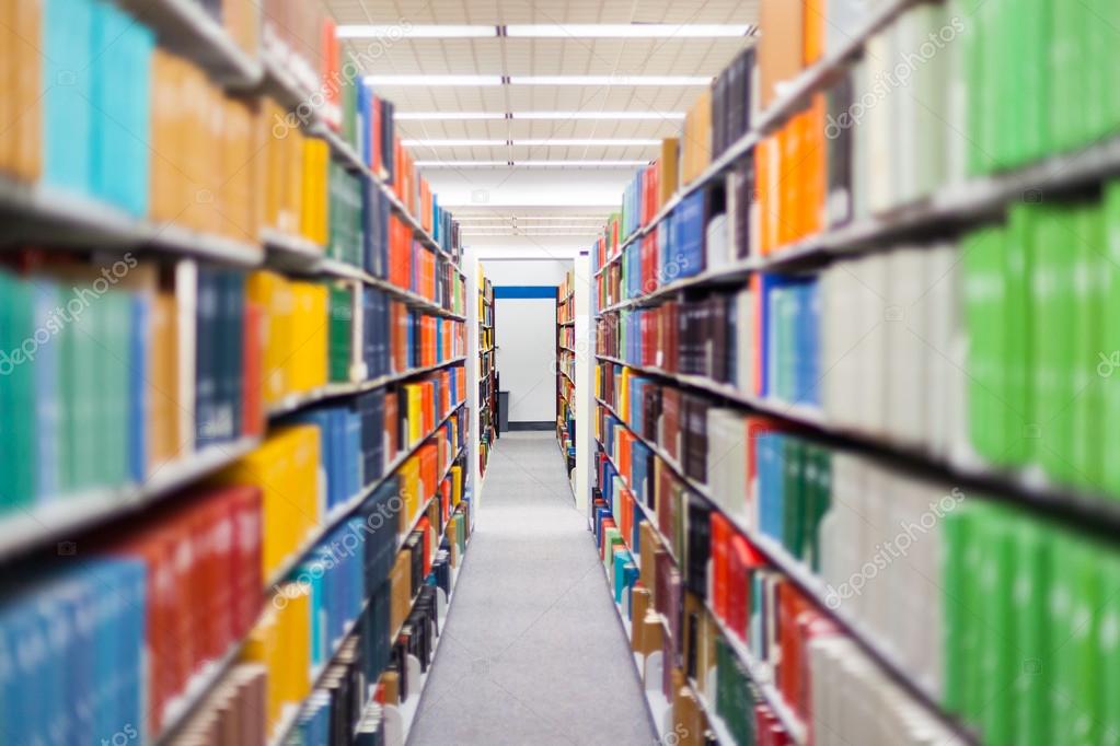 Library setting with books and reading material Stock Photo by ...