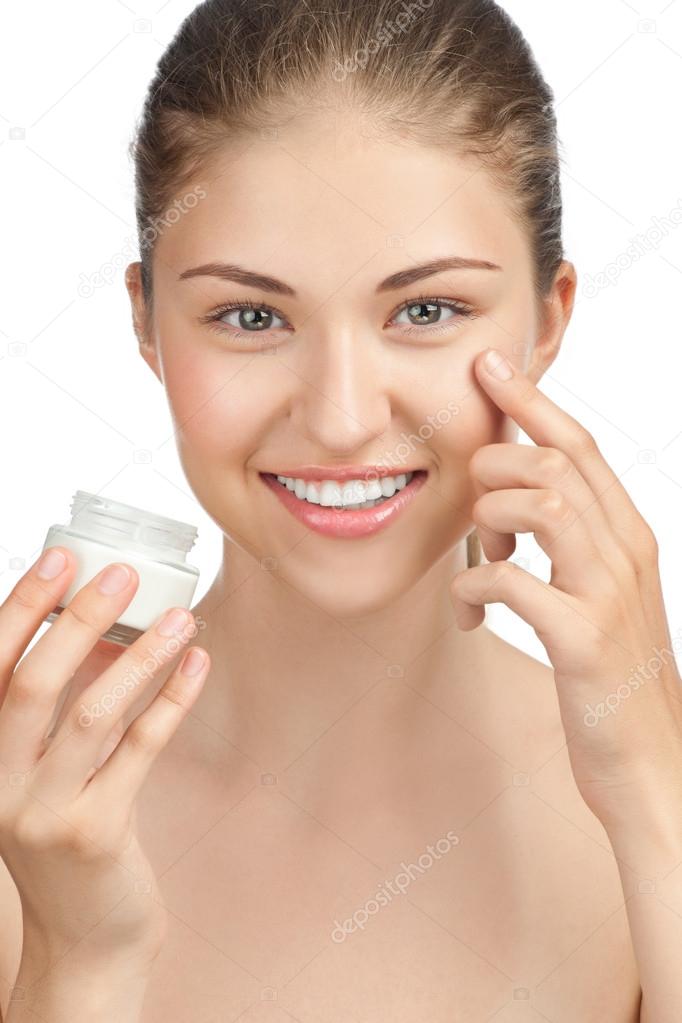 Beautiful woman applying moisturizer cream — Stock Photo © Dragonfly666 ...