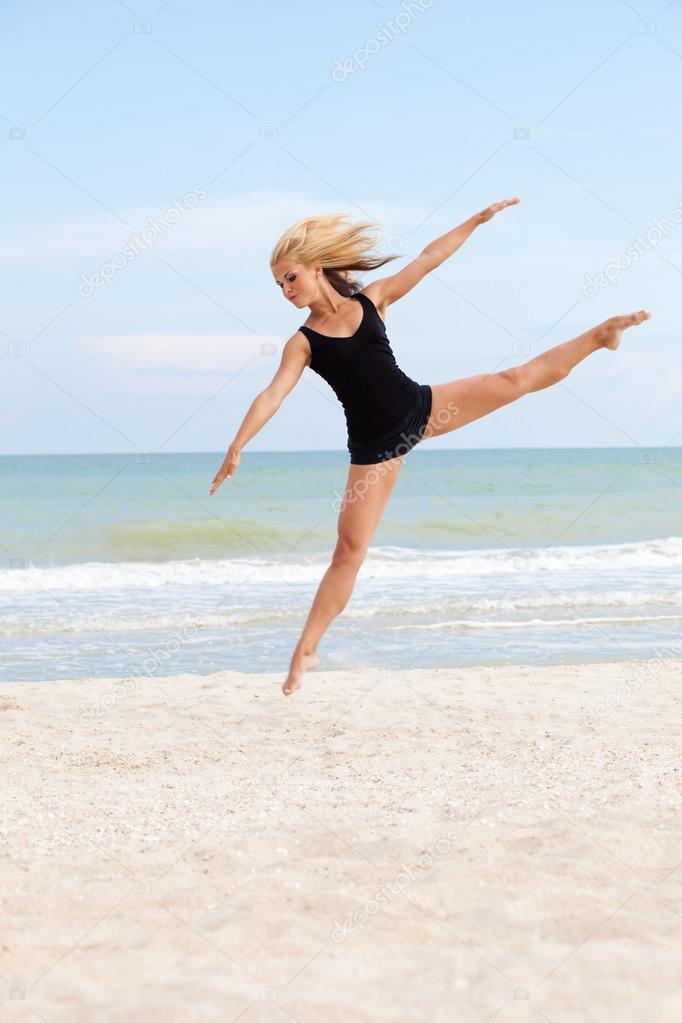 Dancing on the beach ⬇ Stock Photo, Image by © ayakovlev_com #15548785