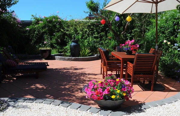 Courtyard garden setting — Stock Photo © amarosy #174478790