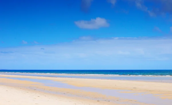 Beautiful beach scene background Stock Photo by ©amarosy 164650212