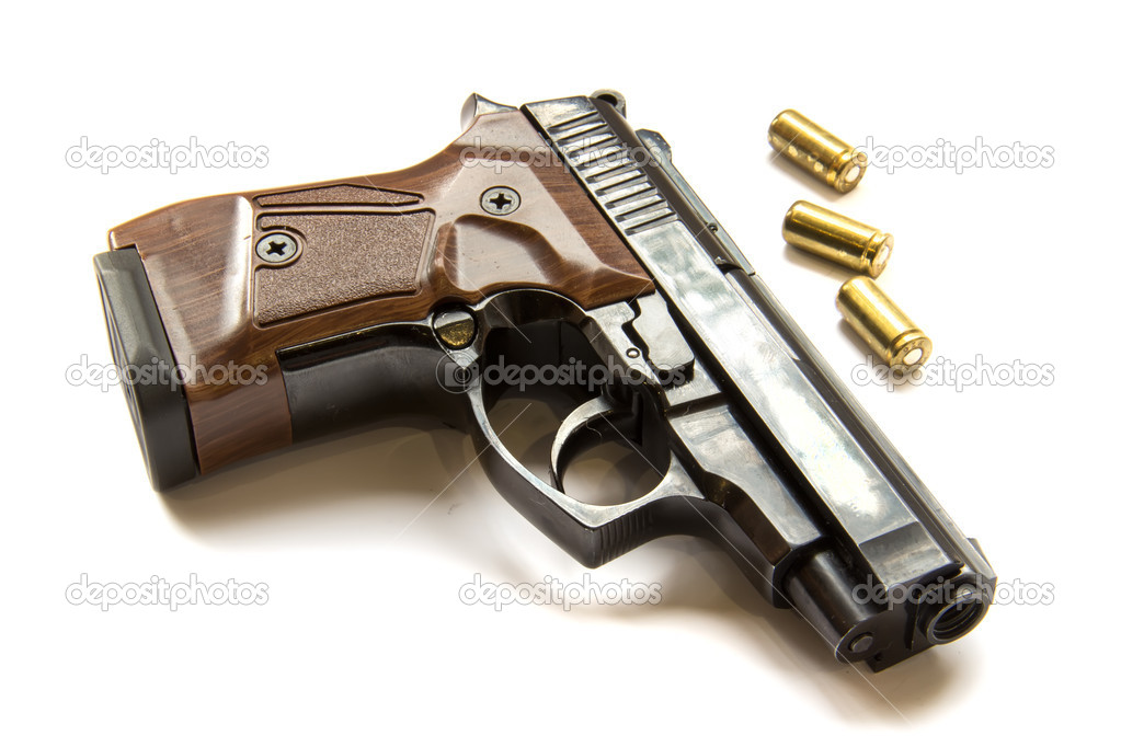Traumatic pistol with bullets on a white background — Stock Photo © Kim ...