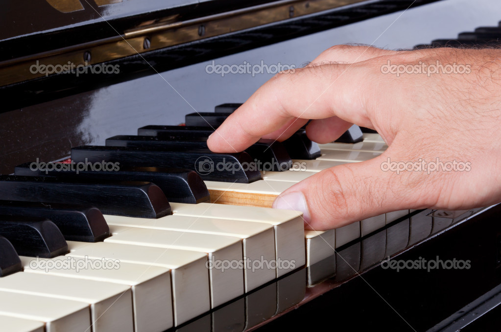 Piano keyboard made of ivory with hands Stock Photo by ©AntonioGravante ...