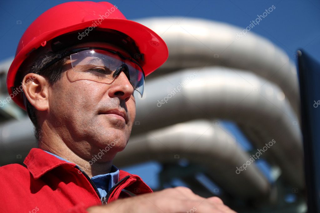 Engineer With Red Hard Hat and Pipelines — Stock Photo © dgdimension ...