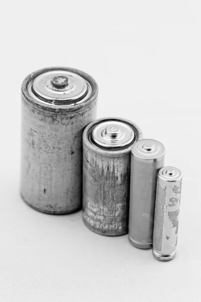 Old batteries on white background Stock Photo by ©NagyDodo 35364133