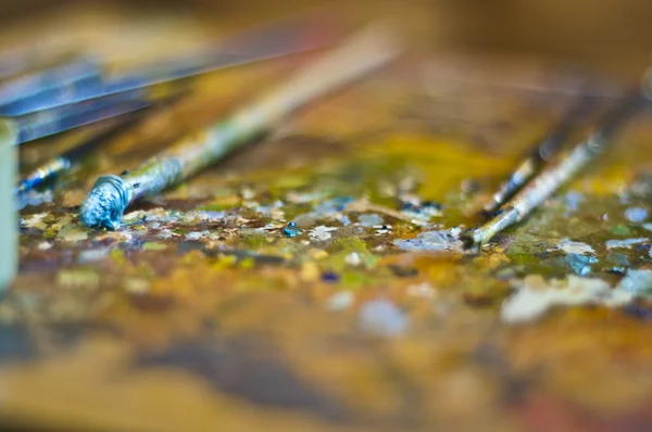 Artist hand painting Stock Photo by ©Amaviael 58962675