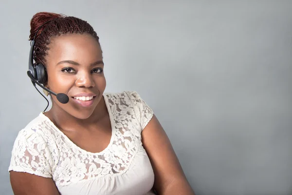Beautiful black call center agent talking client - Stock Image - Everypixel