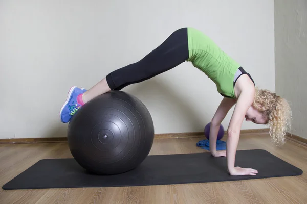 Active Pilates Female using a exercise ball - Stock Image - Everypixel