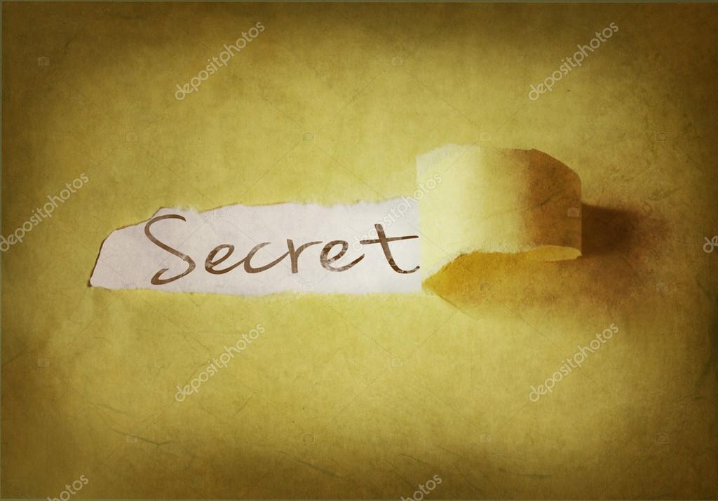 Word secret written under torn strip of paper — Stock Photo © nevarpp ...