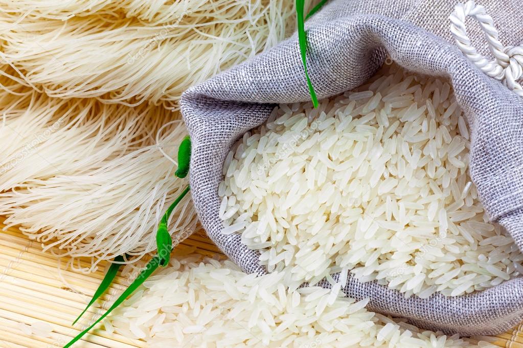 Sack of white rice and rice vermicelli — Stock Photo © olgamark #15349317