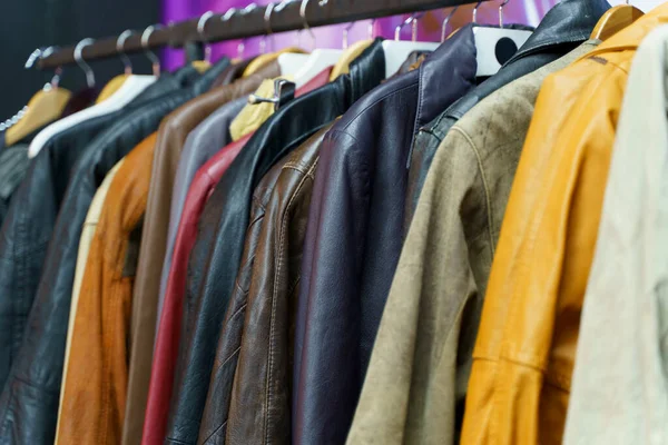 Second hand vintage clothes in a store on sale. Fashionable European ...