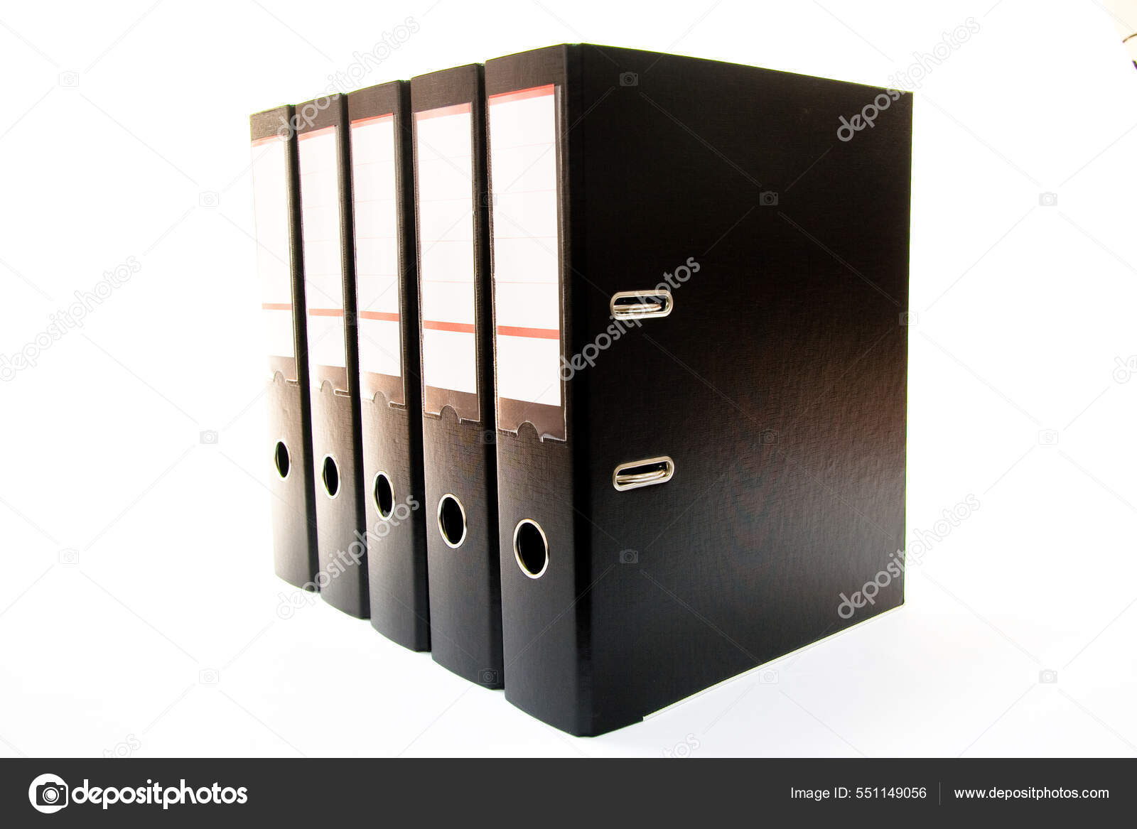 Row of folders for papers and documentation on a shelf in the office ...