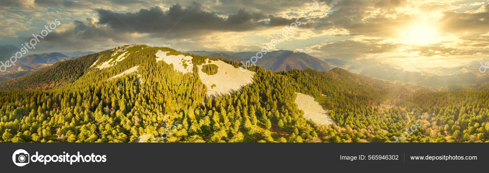 Ukraine. Sunrise shines in the Carpathians, colored fog spreads over ...