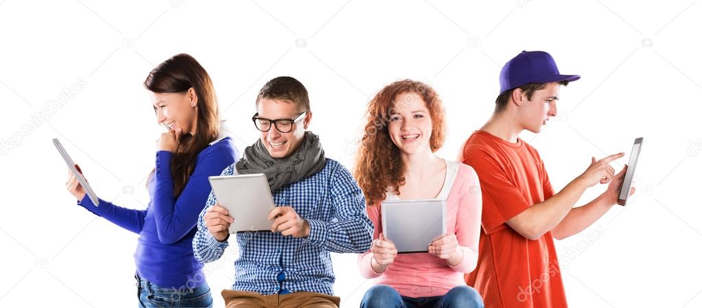 Young people with tablets Stock Photo by ©halfpoint 34534091
