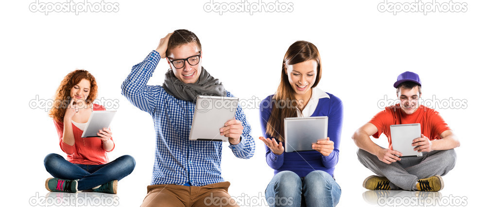 Young people with tablets Stock Photo by ©halfpoint 34534461