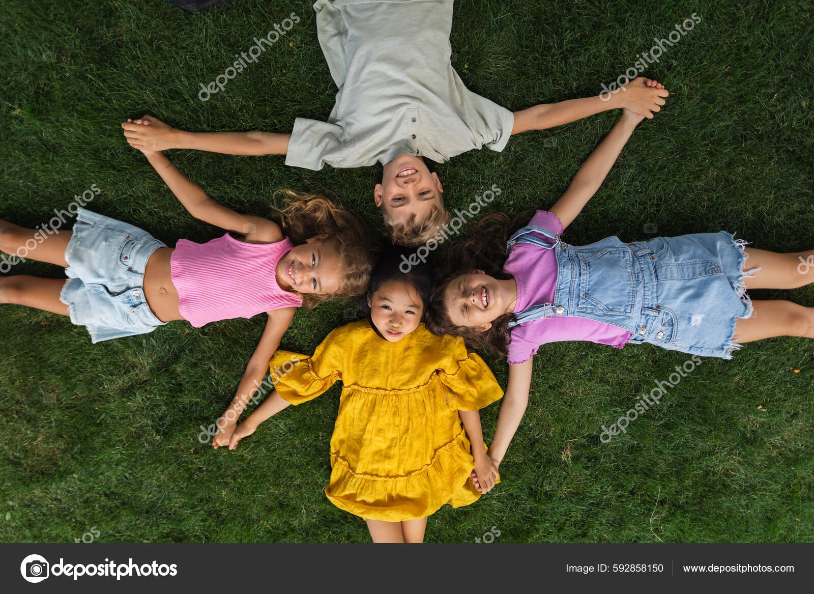 Four Friends Holding Hands