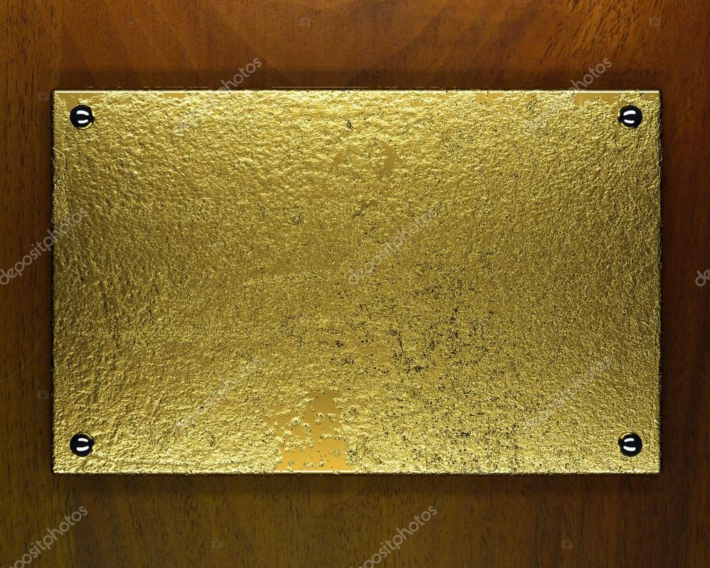 Gold metal plate on wooden background. Template for design Stock Photo ...