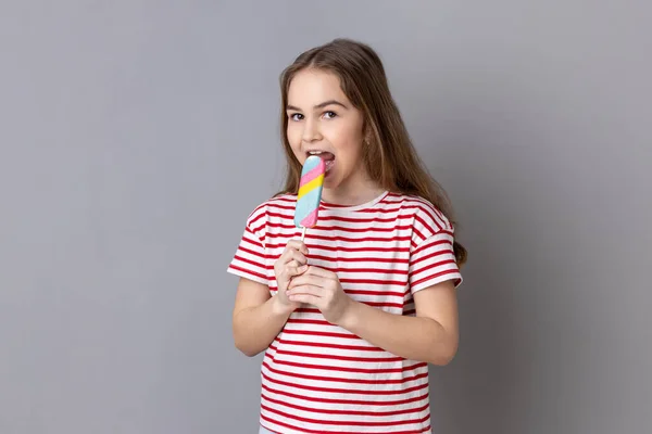 Girl eating popsicle Stock Photos, Royalty Free Girl eating popsicle ...