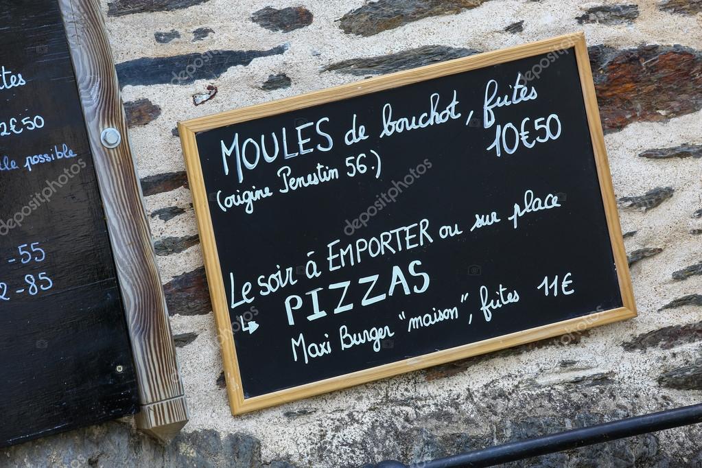 Menu board outside a French restaurant — Stock Photo © Pixinooo #51328581