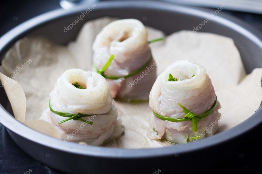 Cooking rolls of white fish fillet stuffed with herbs Stock Photo by ...