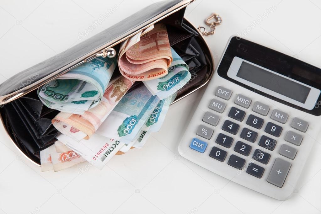 Russian money in your wallet and calculator Stock Photo by ©Milly7 51497029