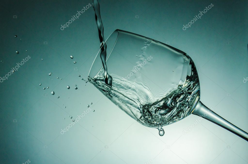 Water splash with wine glass Stock Photo by ©mrsiraphol 33100693