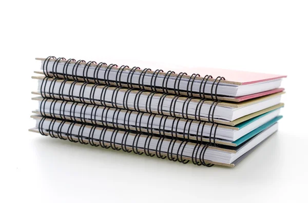 A stack of paper notebooks Stock Photos, Royalty Free A stack of paper ...